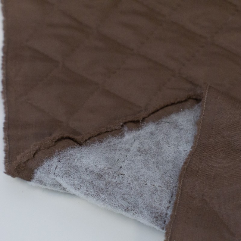 Tela de acolchado rombos exterior lisa